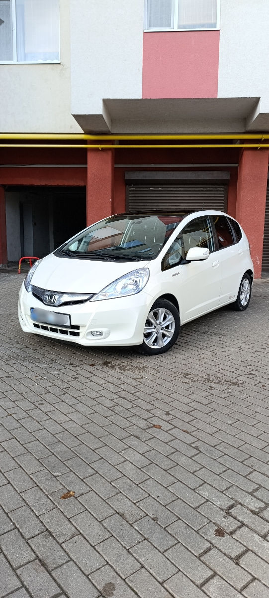 Honda Jazz 2013 г. с пробегом 184 км, Гибрид, 5999
