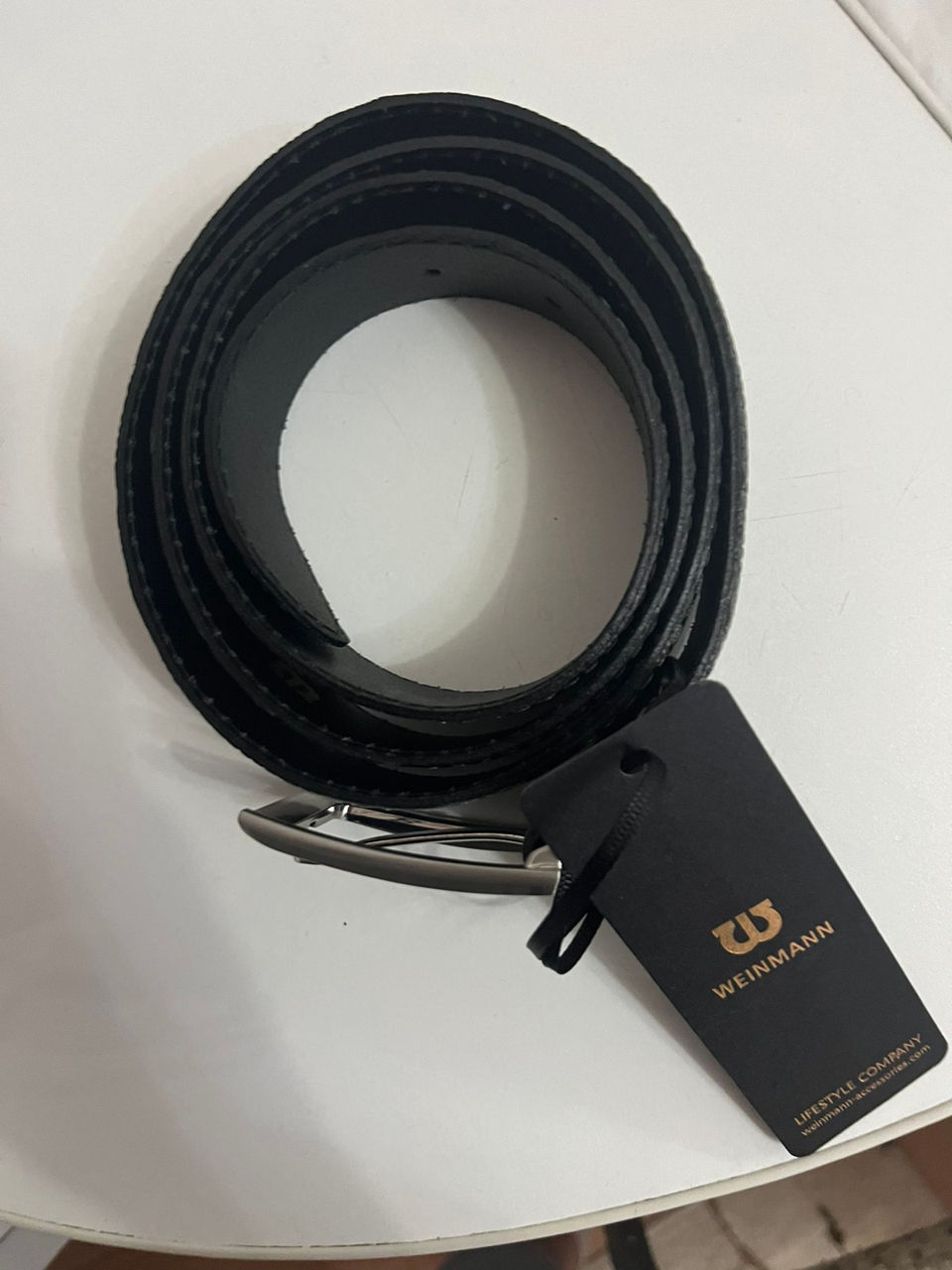 Curea din piele naturala,originala a costat 65 de dolari