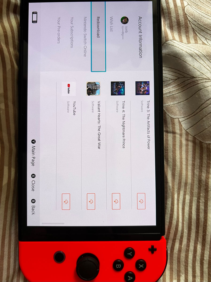 Vând Nintendo Switch OLED + account + cartridge-uri + husa
