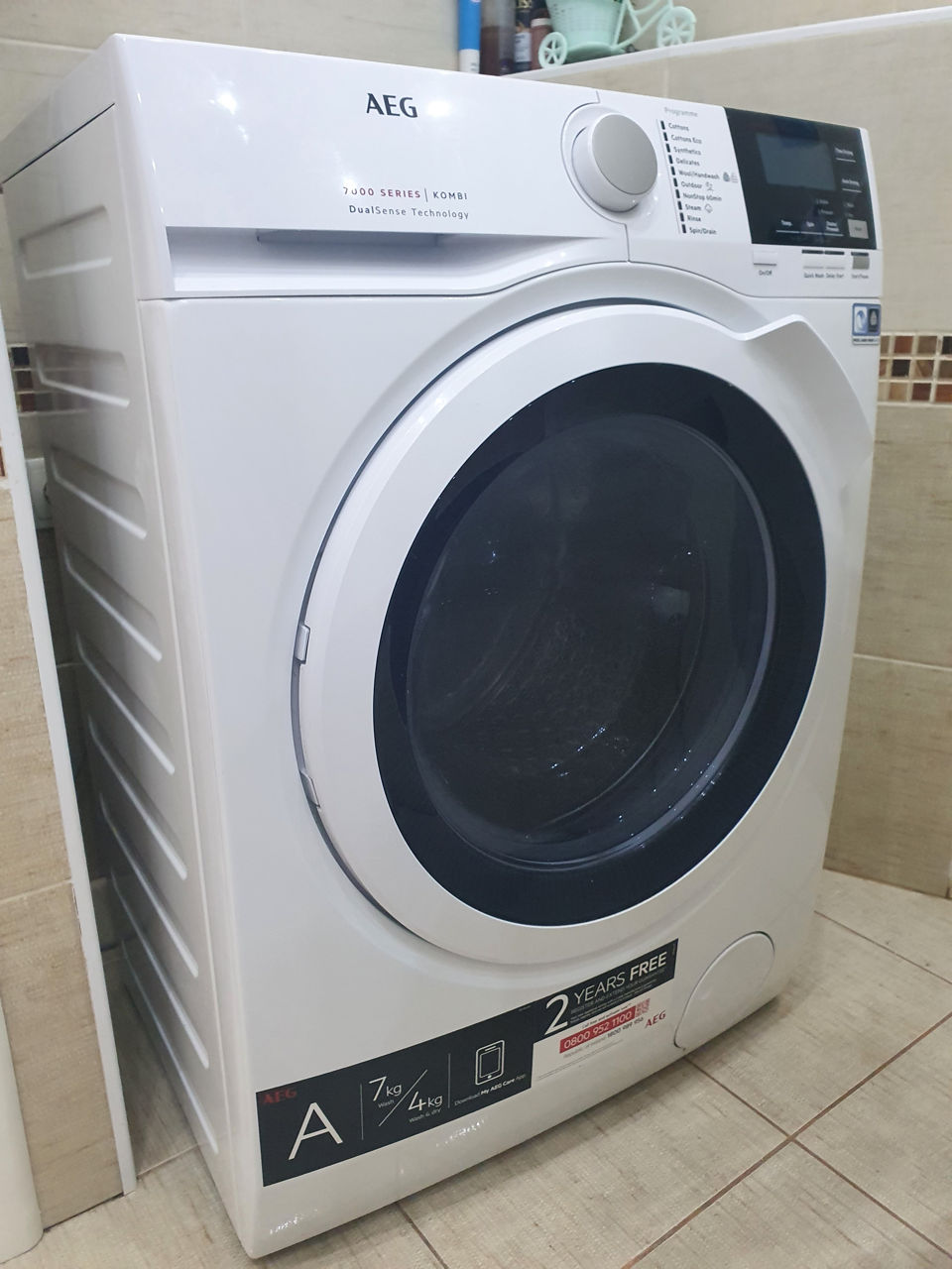 Se vinde masina de spalat AEG 7000 series dual combi 7KG cu uscator ...