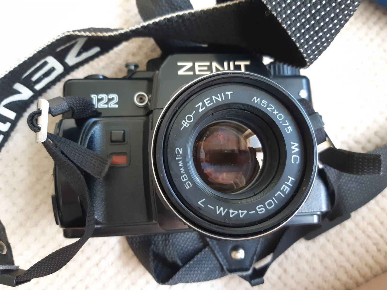 Zenit 122 новый, оригинальным ремешком и сумкой.