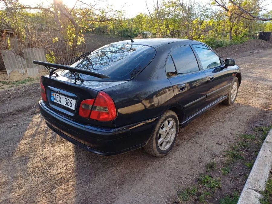 Mitsubishi Carisma an. 2001 cu rulaj 322448 km, Benzină, 1150
