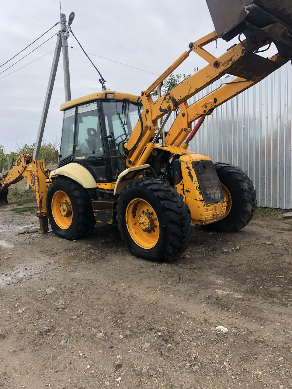 Buldoexcavator JCB CX4