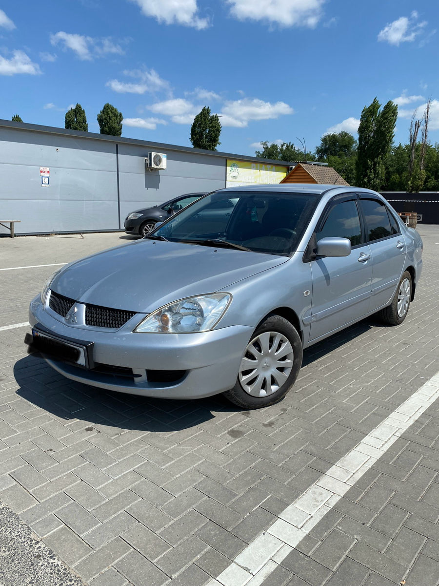 Mitsubishi Lancer an. 2009 cu rulaj 230000 km, Benzină, 3900