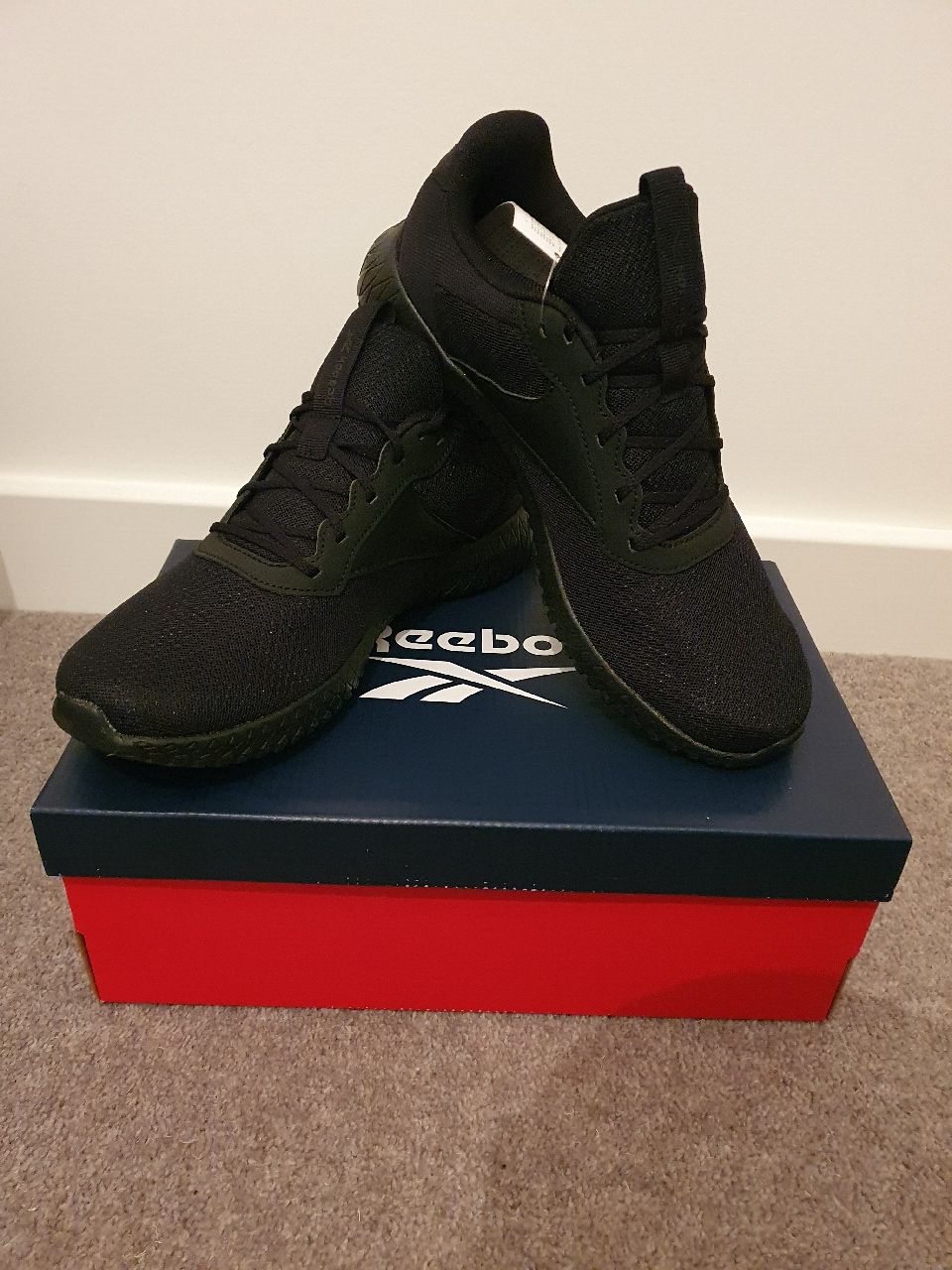 Reebok, New Balance.