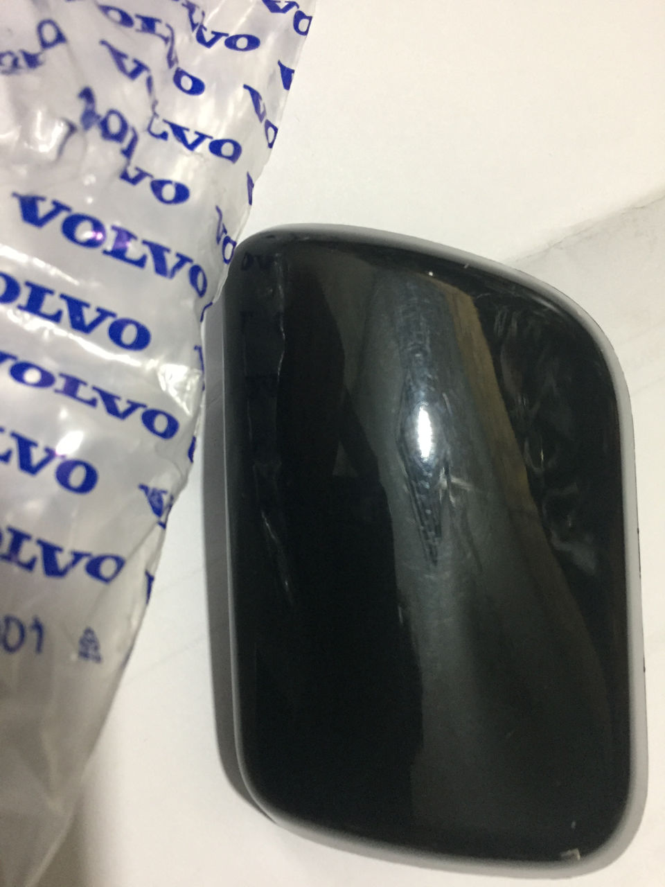 Volvo крышка омывателя фары левой