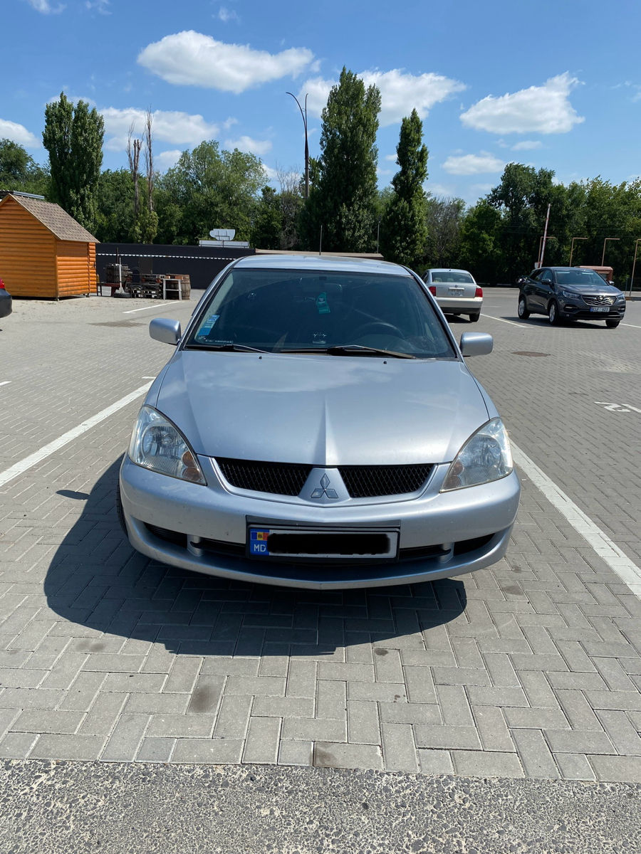 Mitsubishi Lancer an. 2009 cu rulaj 230000 km, Benzină, 3900