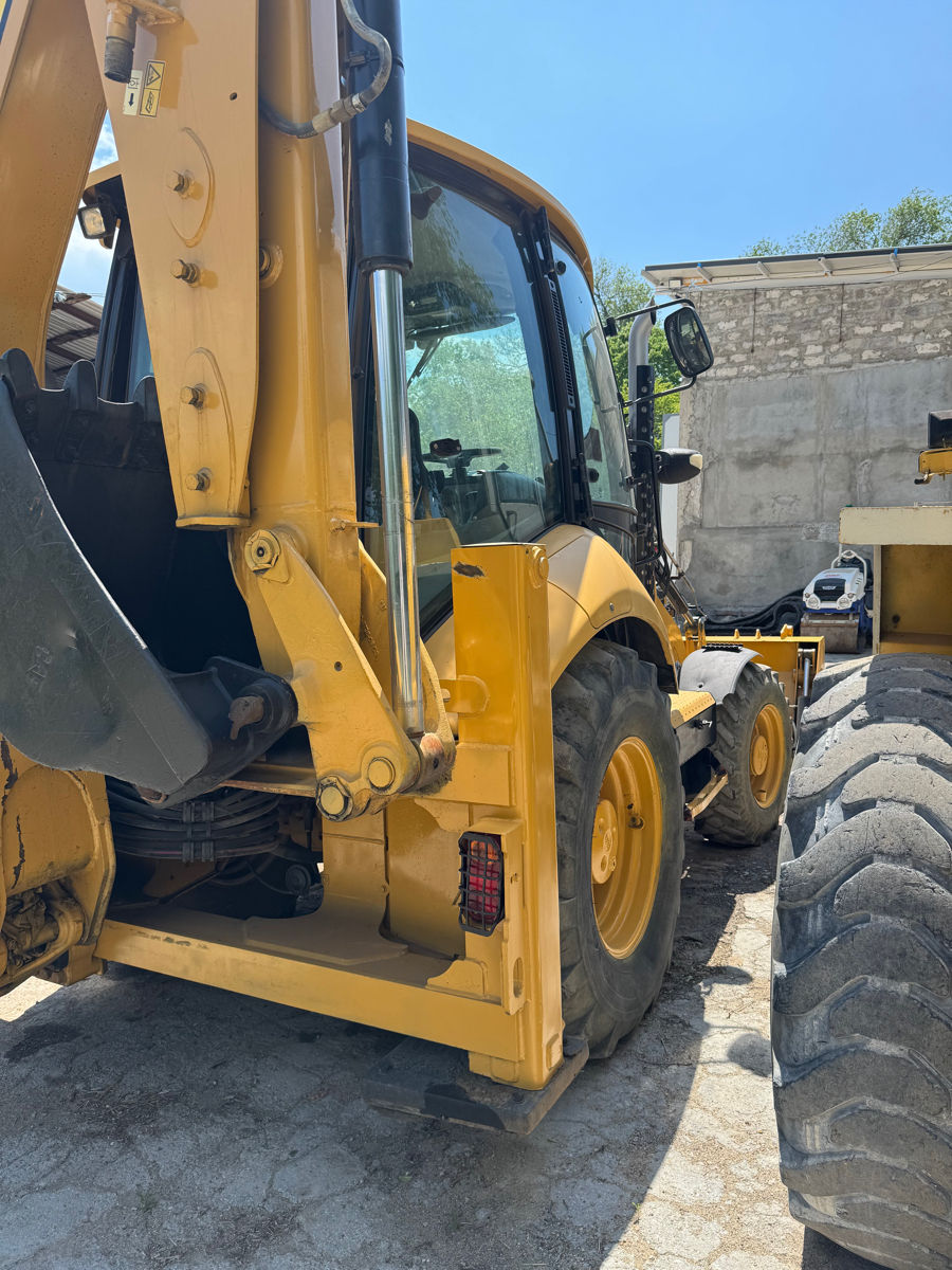 Buldoexcavator cat 428f